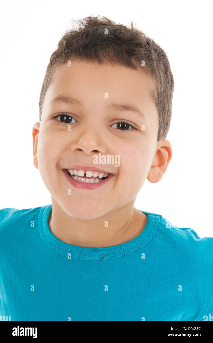 Portrait of five years old boy with a smile isolated over white ...