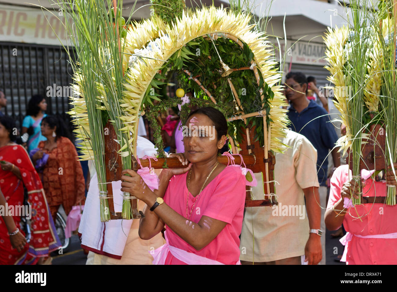 A female devotee of Lord Muruga carrying the Cavadee, Mauritius Stock ...