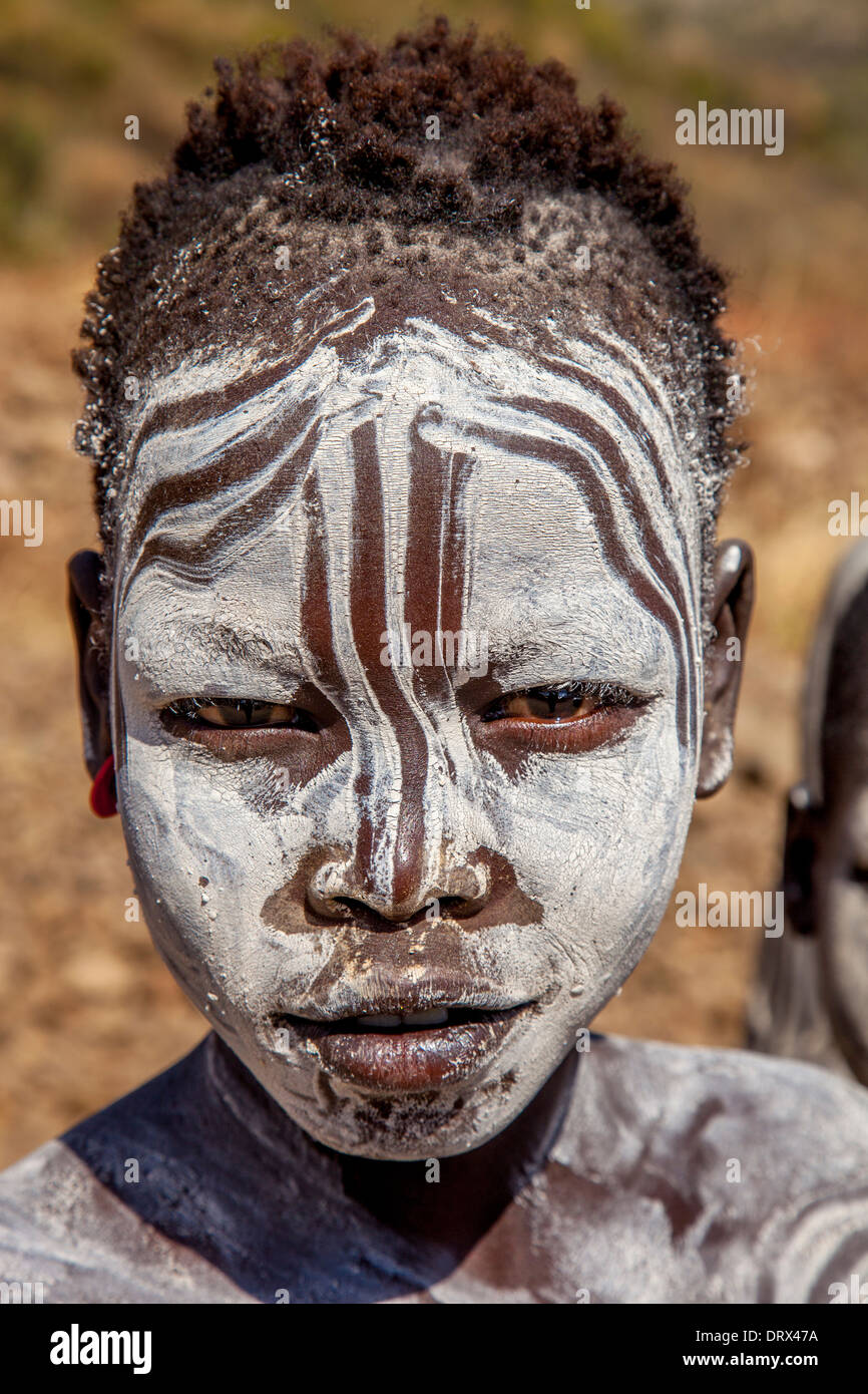 Portrait Of A Mursi Boy, The Omo Valley, Ethiopia Stock Photo - Alamy