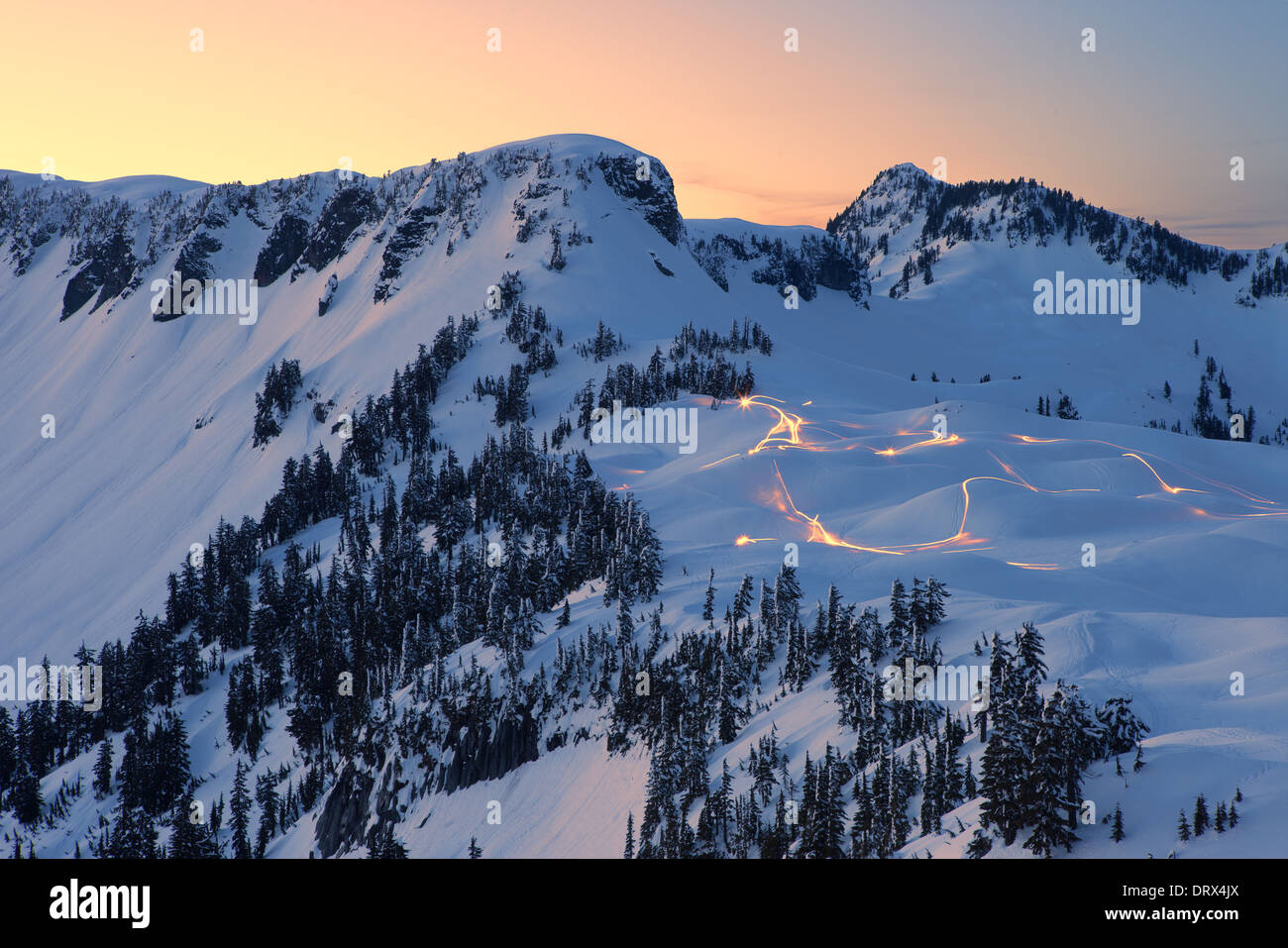 Lights on Snow Mountain Stock Photo - Alamy