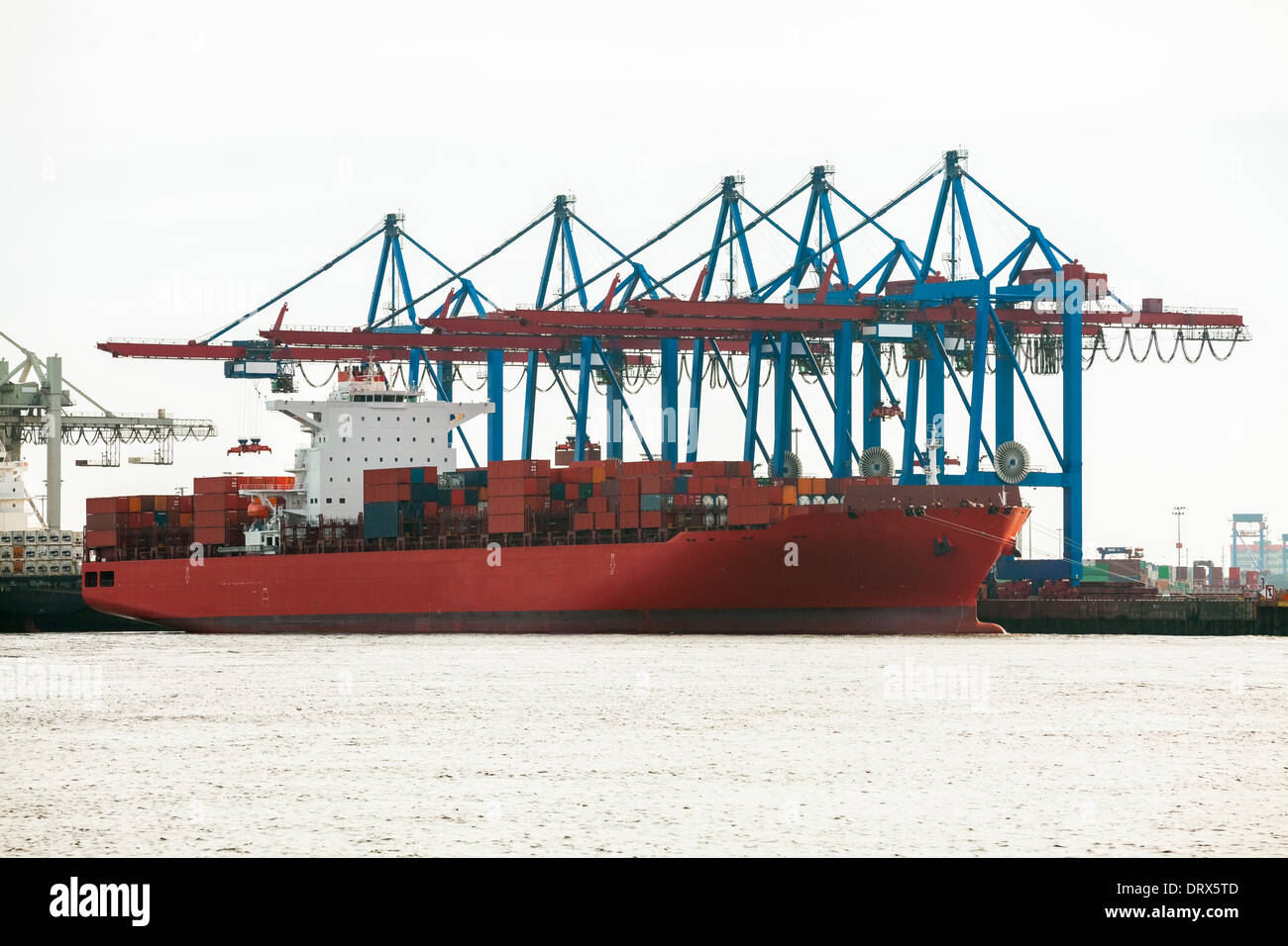 Loading and unloading cargo into and from ships hi-res stock ...