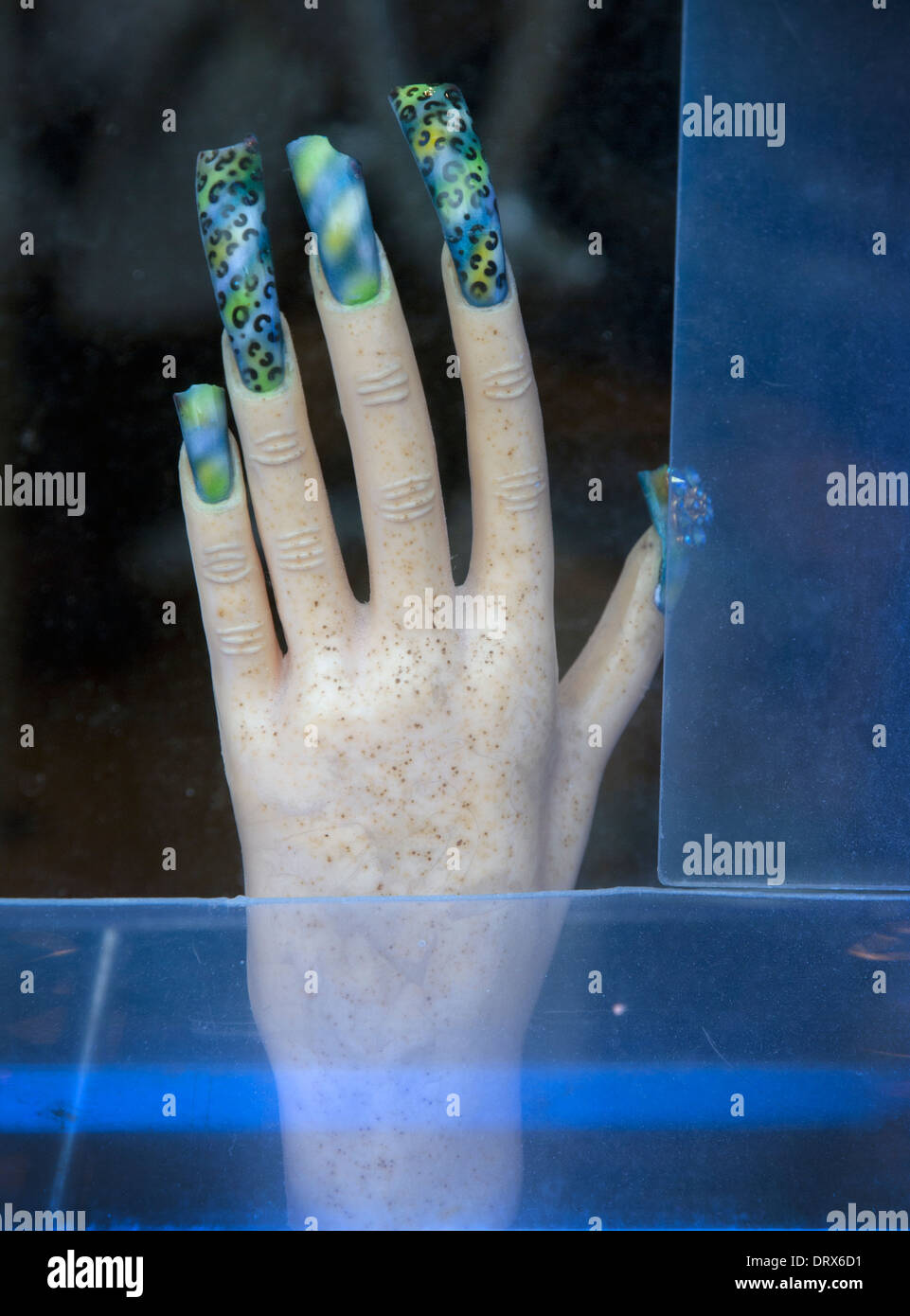 A window display in a Brighton nail bar Stock Photo - Alamy