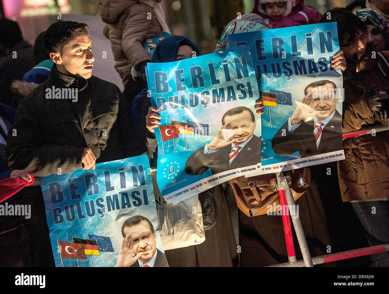 Berlin, Germany. 03rd Feb, 2014. People hold posters with Turkish ...
