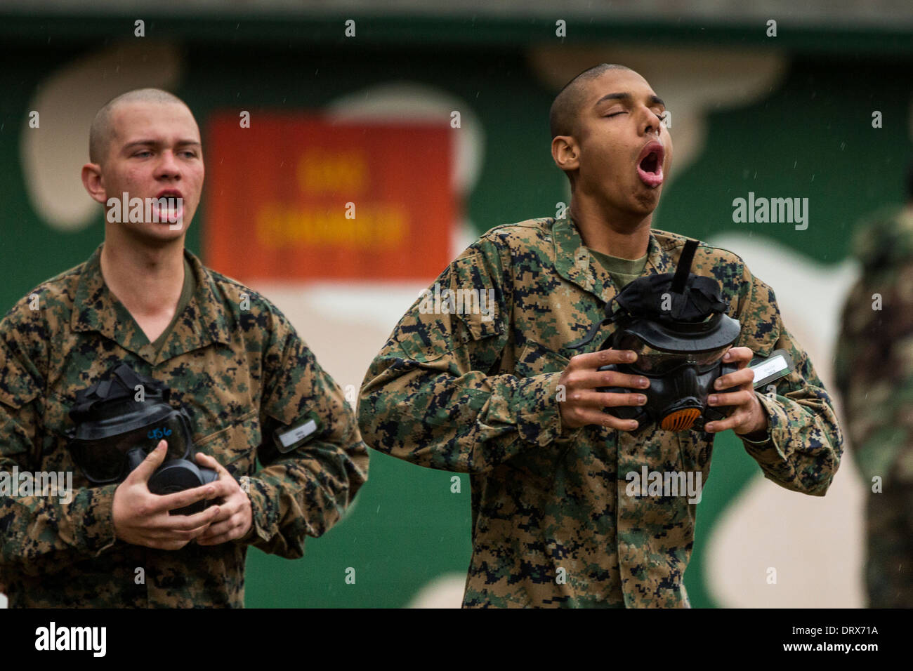 US Marine recruits choke and gasp for air after exiting the gas chamber ...