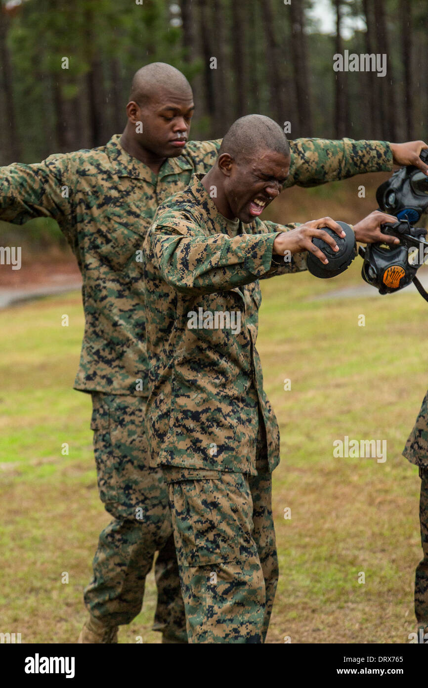 US Marine recruits choke and gasp for air after exiting the gas chamber ...