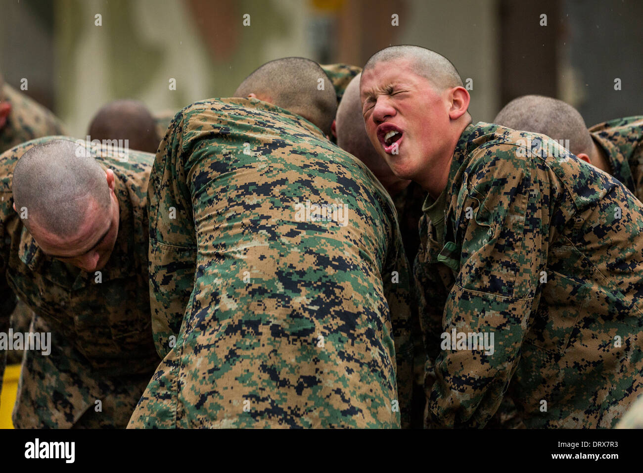 US Marine recruits choke and gasp for air after exiting the gas chamber ...