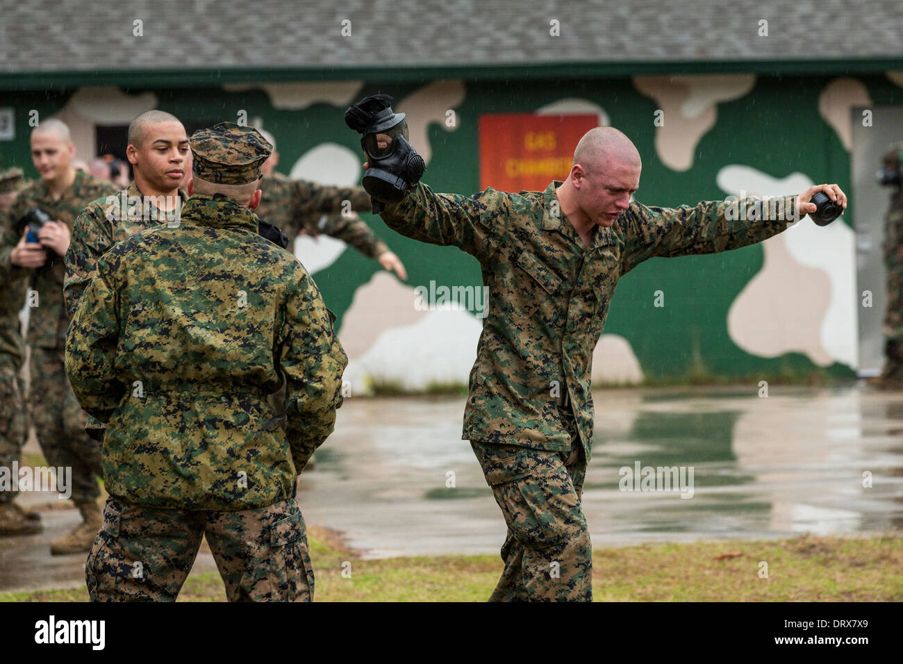 US Marine recruits choke and gasp for air after exiting the gas chamber ...