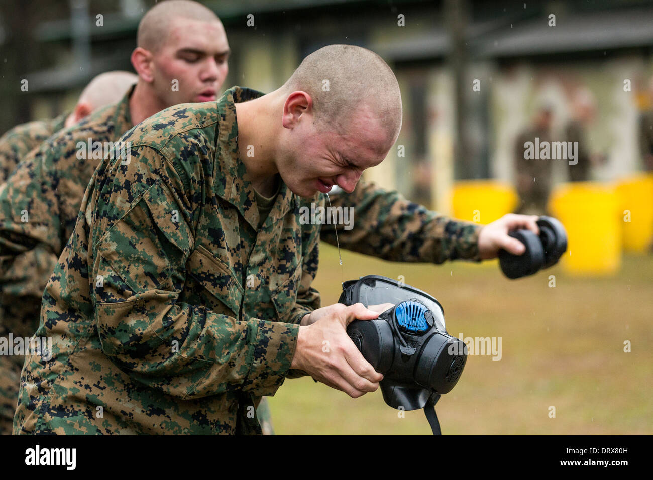 US Marine recruits choke and gasp for air after exiting the gas chamber ...