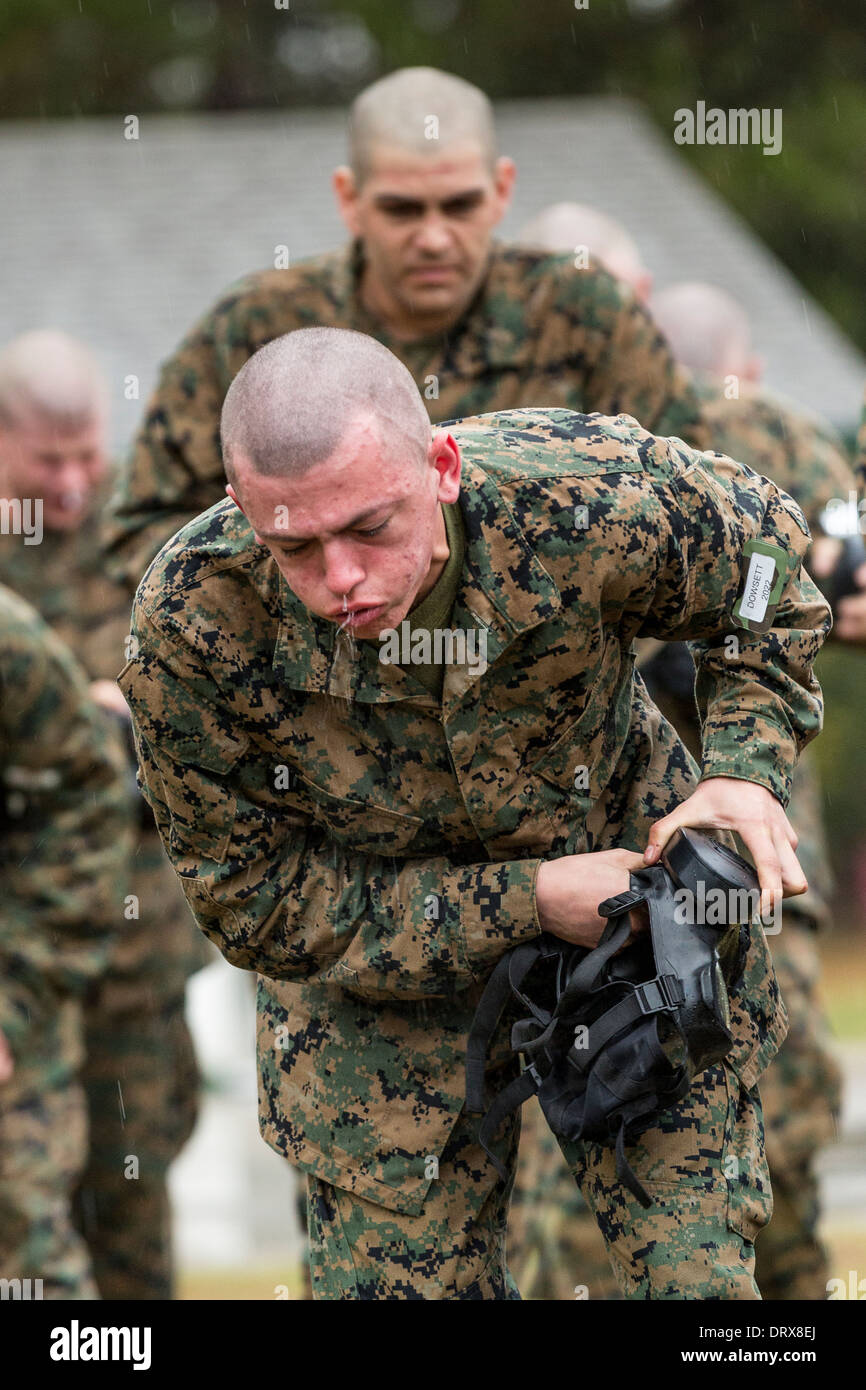 US Marine recruits choke and gasp for air after exiting the gas chamber ...
