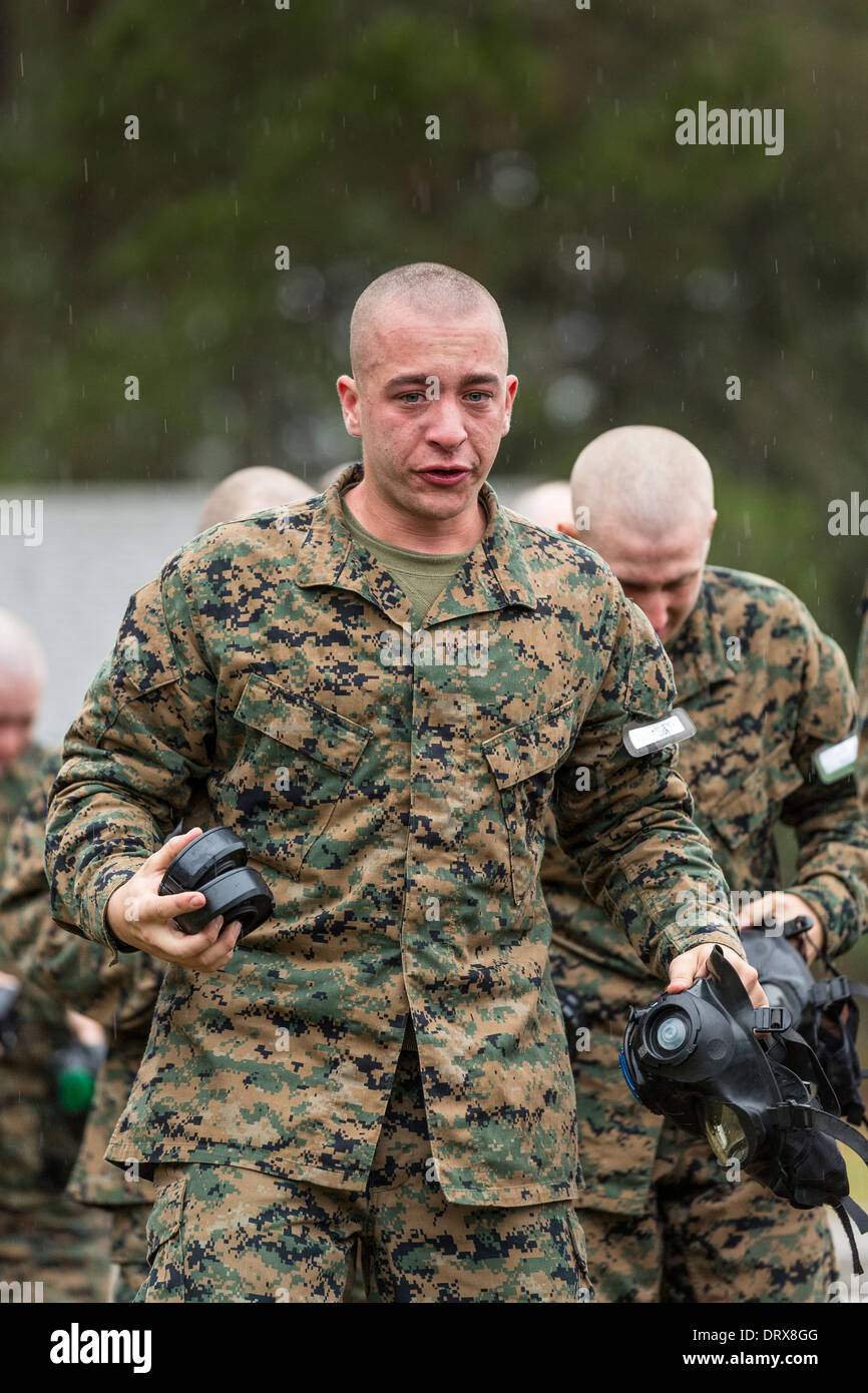 US Marine recruits choke and gasp for air after exiting the gas chamber ...