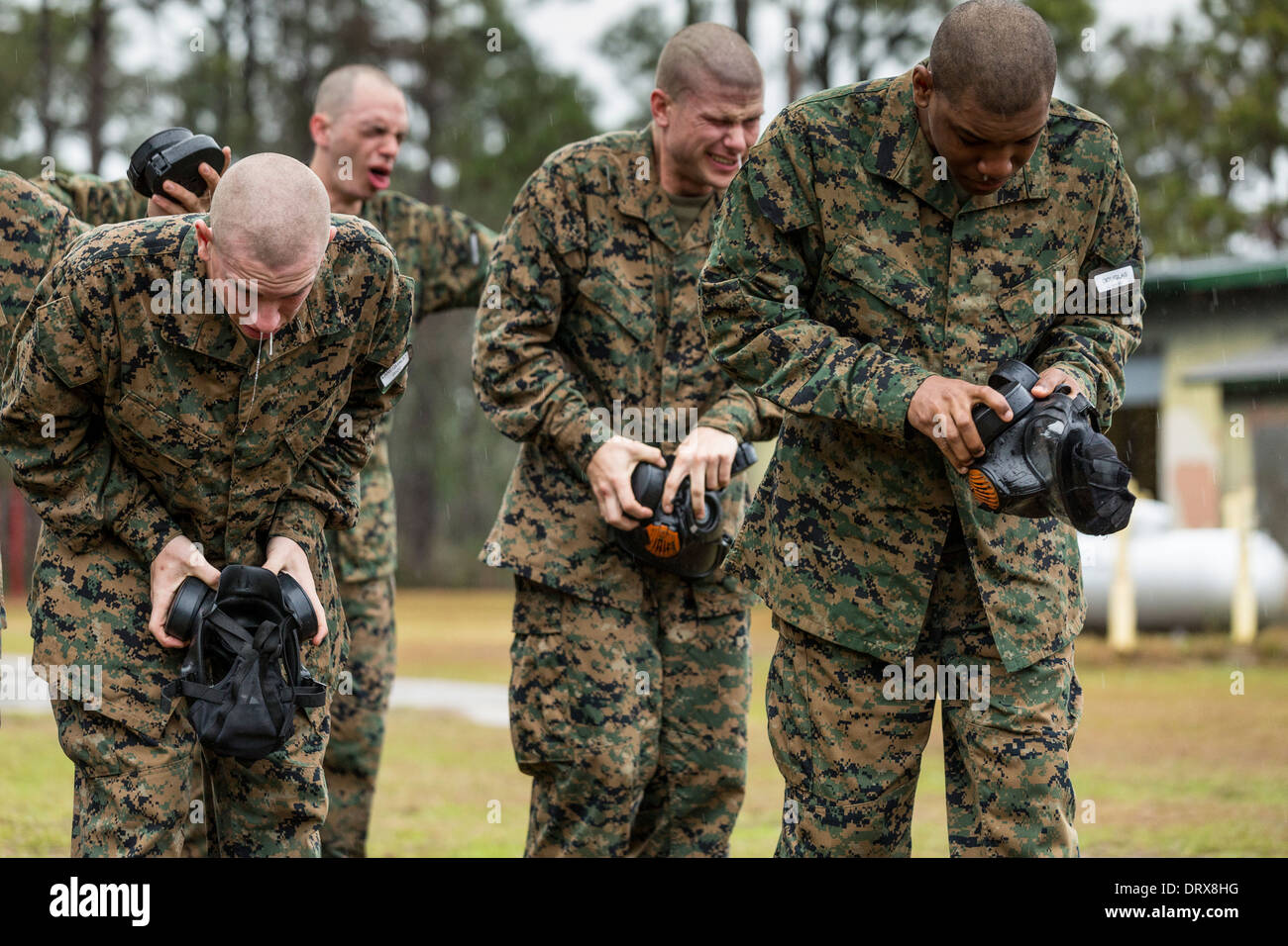US Marine recruits choke and gasp for air after exiting the gas chamber ...