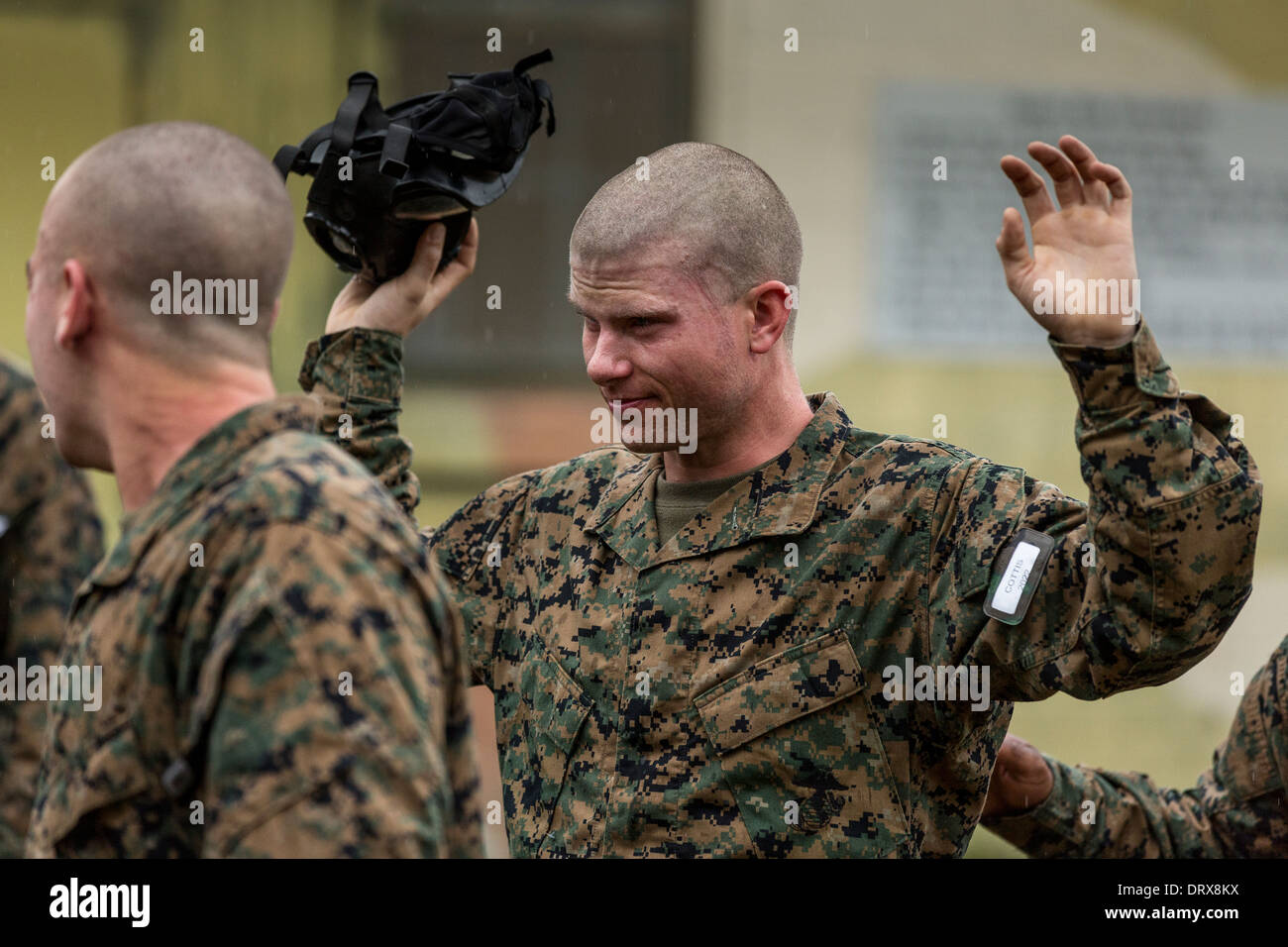 US Marine recruits choke and gasp for air after exiting the gas chamber ...
