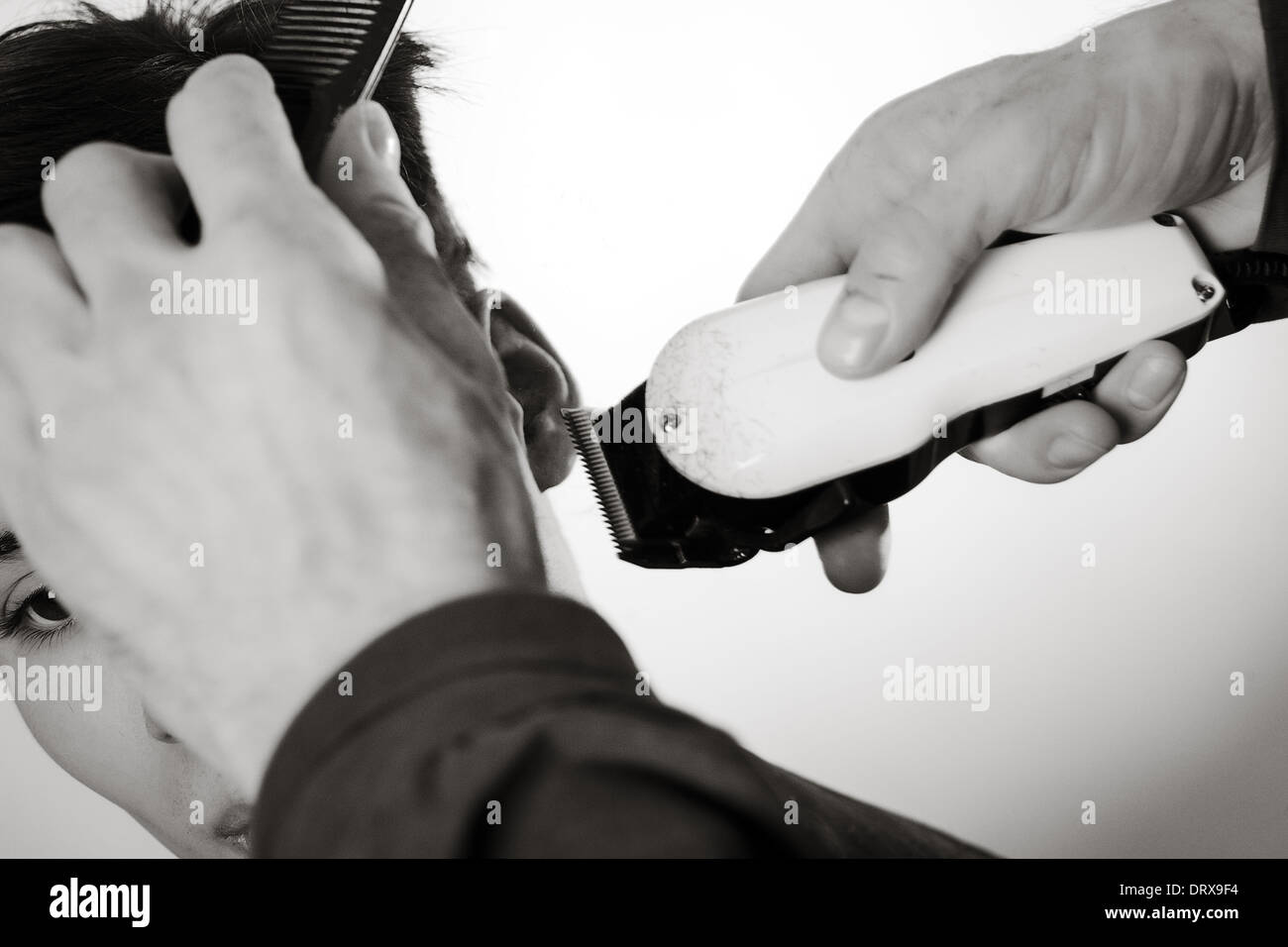 close up shot of man getting his hair cut Stock Photo - Alamy