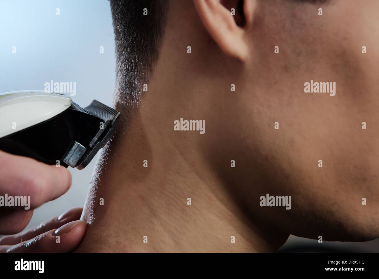 close up shot of man getting his hair cut Stock Photo - Alamy