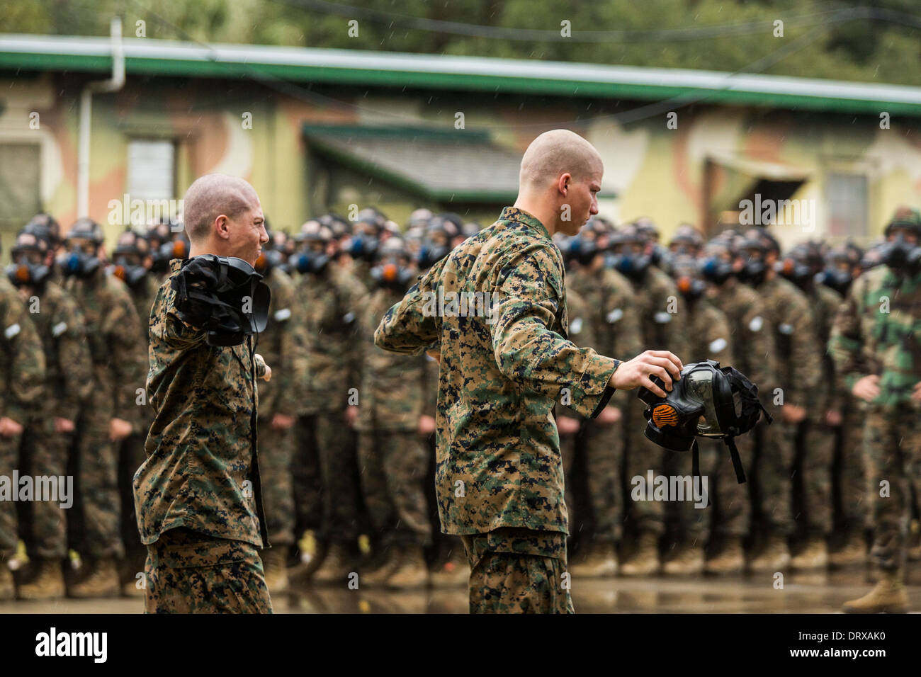 US Marine recruits choke and gasp for air after exiting the gas chamber ...