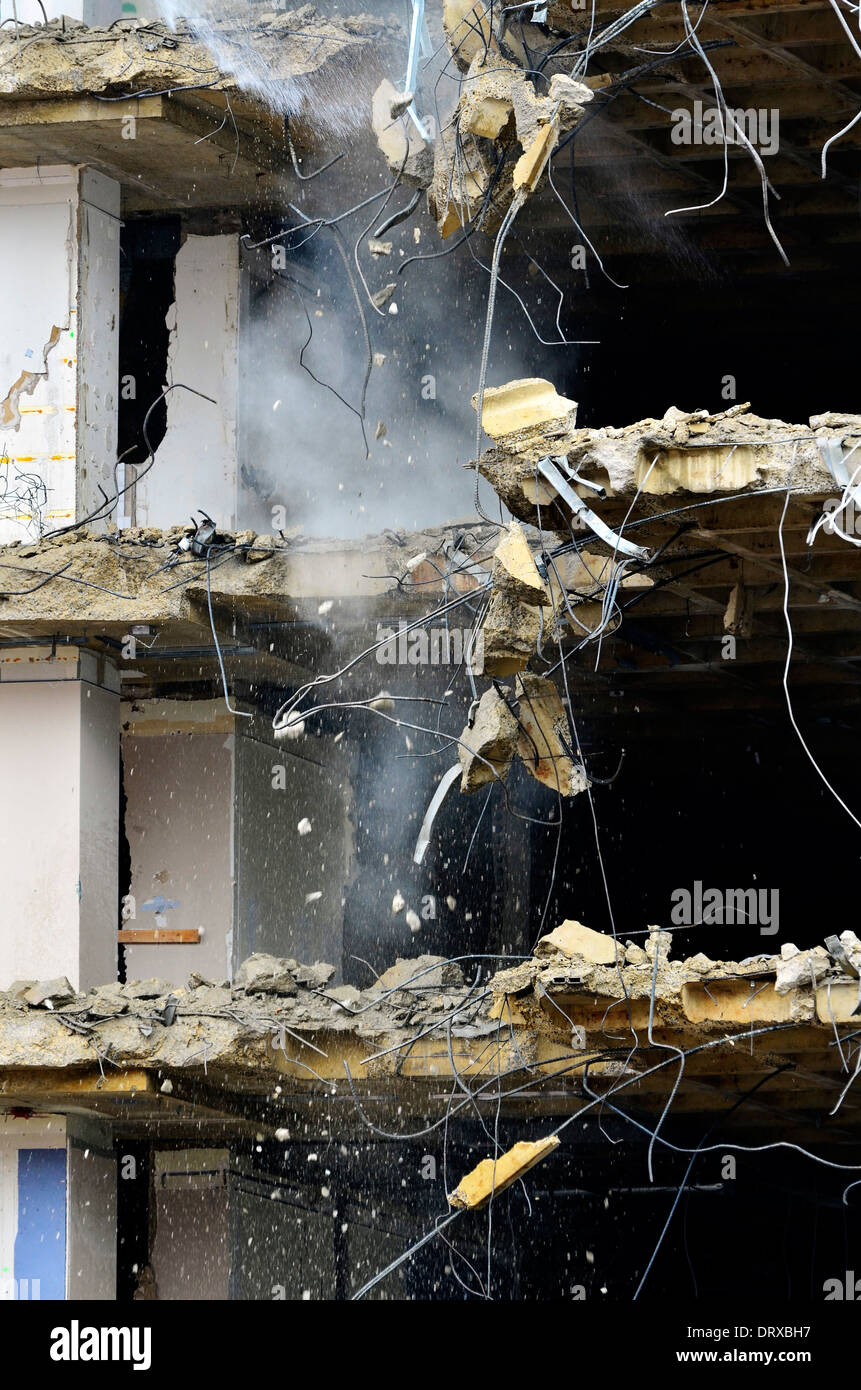 Building collapsing or being demolished with debris falling down Stock ...
