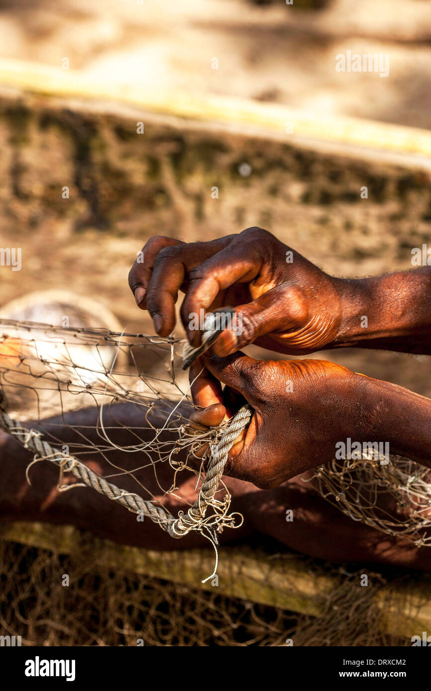 Repairing fishing net hi-res stock photography and images - Alamy