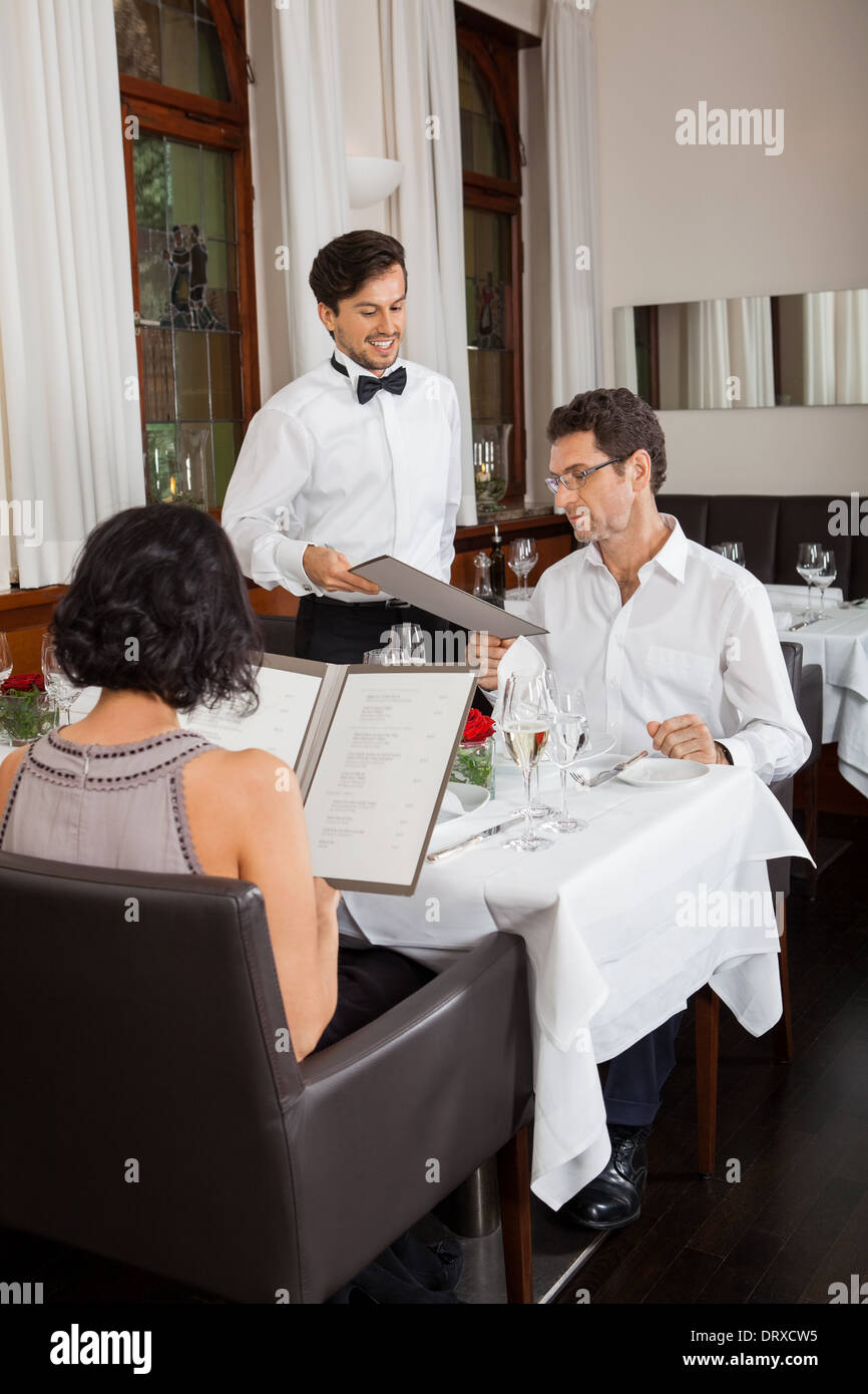 Beautiful young couple ordering hi-res stock photography and images - Alamy