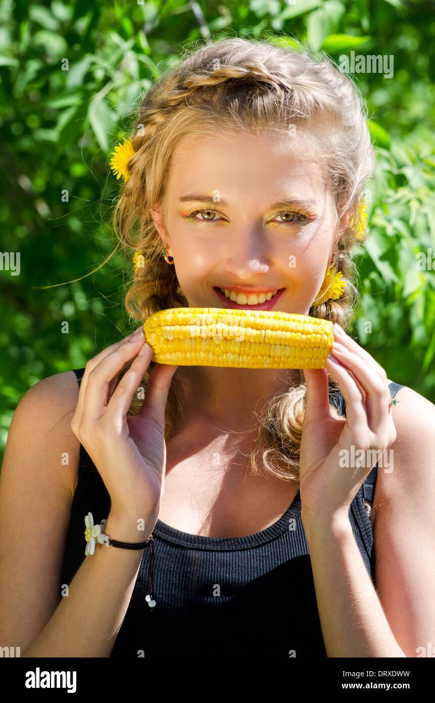woman eating corn-cob Stock Photo - Alamy