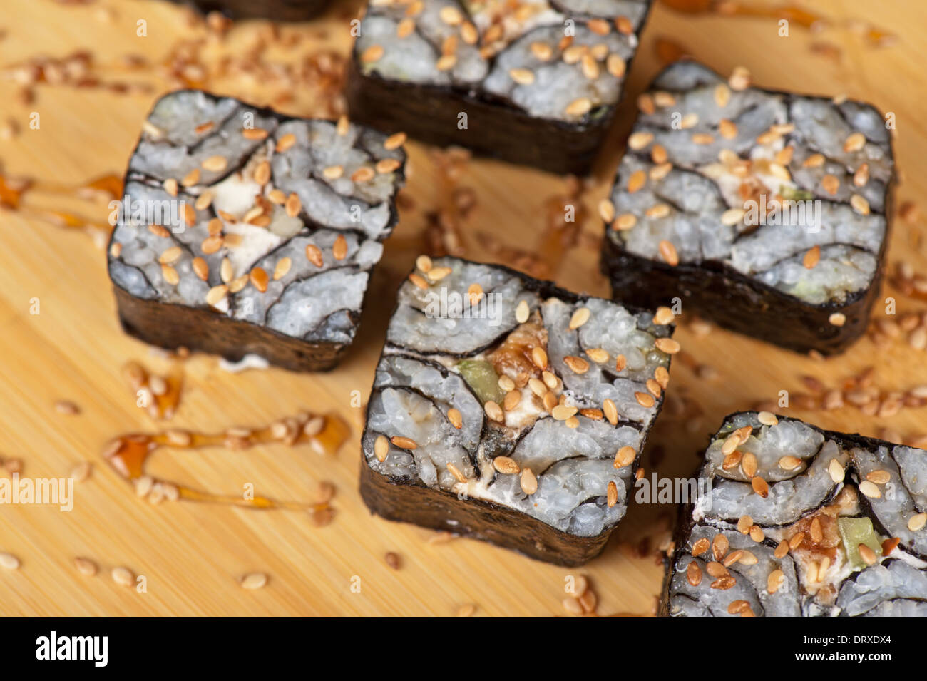 sesame sushi rolls Stock Photo - Alamy