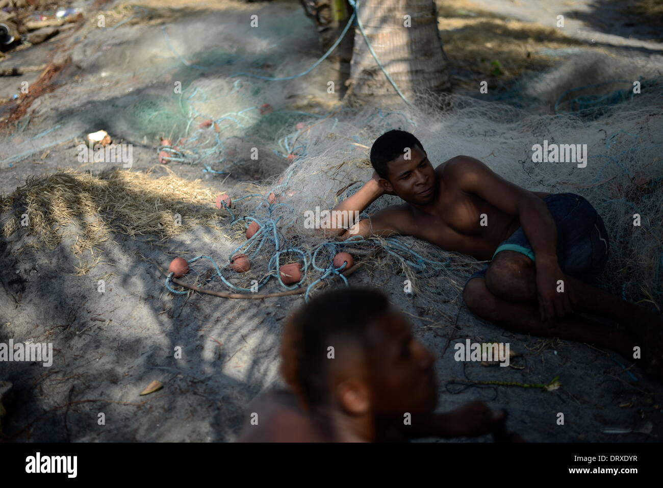 Chame, Panama. 3rd Feb, 2014. Fishermen rest after going fishing in the ...