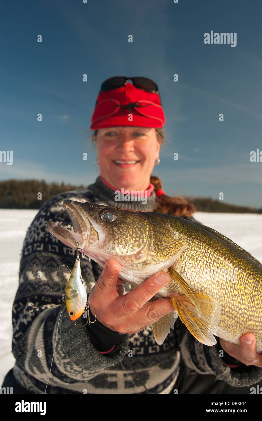 Woman ice fishing hi-res stock photography and images - Alamy