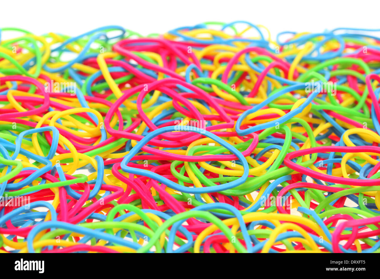 colorful rubber bands isolated on white background Stock Photo - Alamy