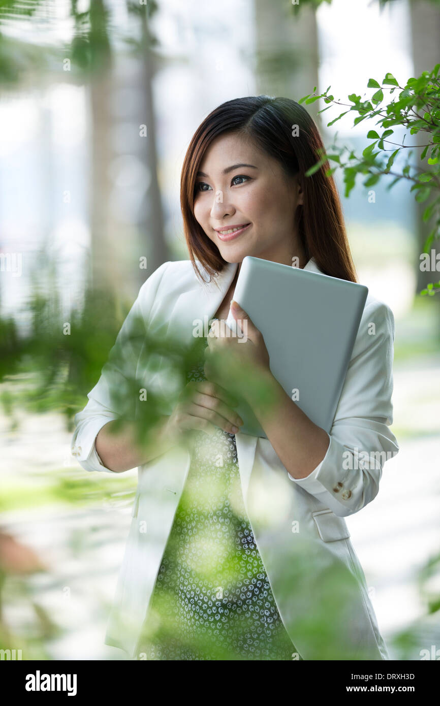 Chinese business woman with a tablet computer. Asian business woman ...
