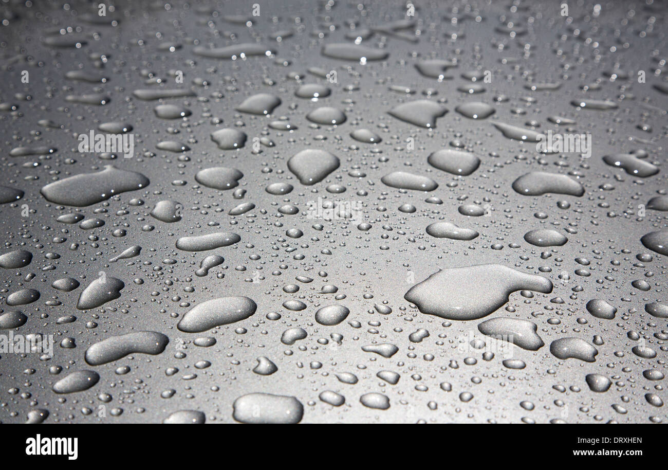 Water droplets on shiny metal surface Stock Photo - Alamy