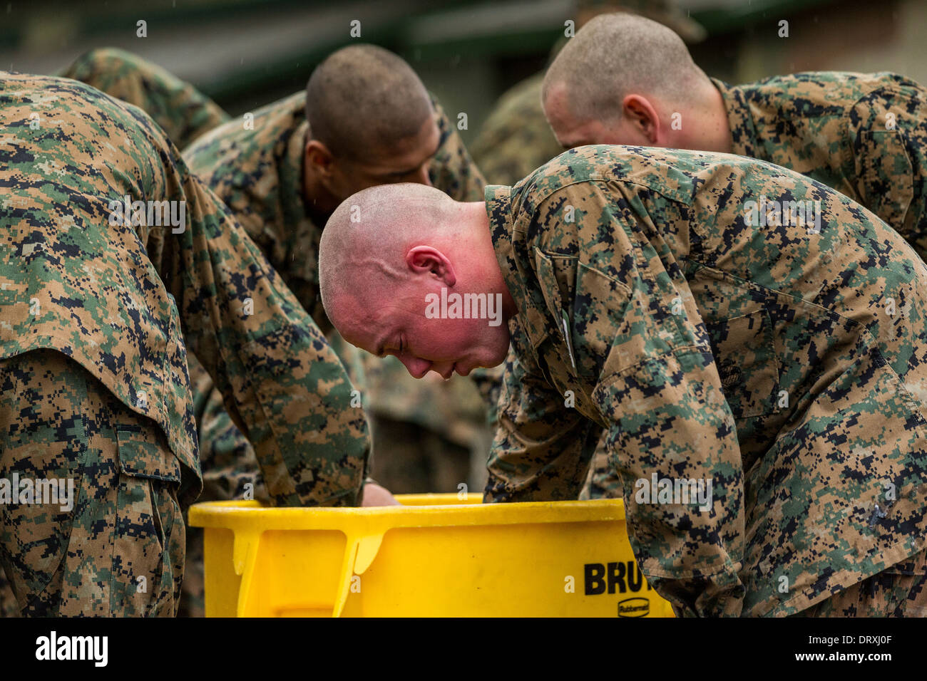 US Marine recruits choke and gasp for air after exiting the gas chamber ...