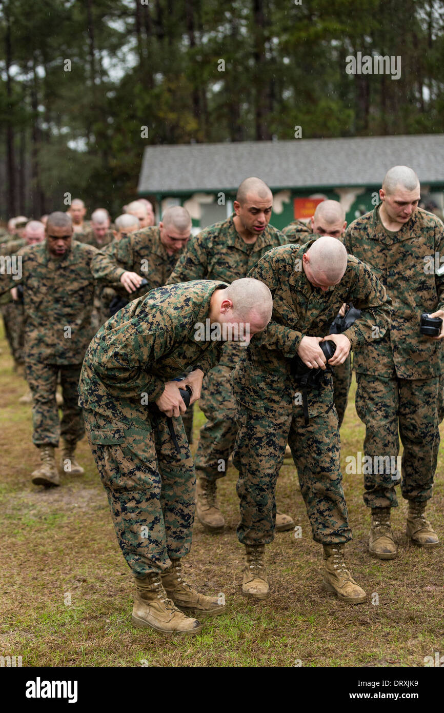 US Marine recruits choke and gasp for air after exiting the gas chamber ...