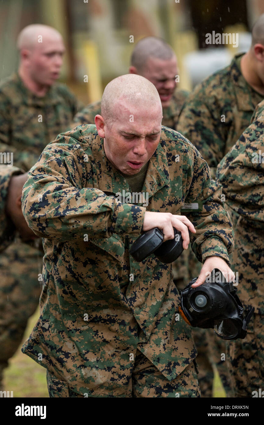 US Marine recruits choke and gasp for air after exiting the gas chamber ...