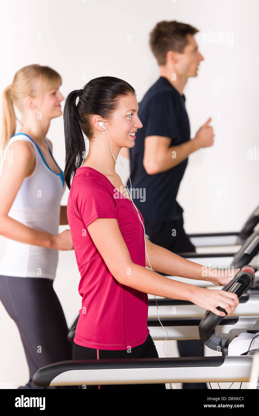 Young people on treadmill running exercise Stock Photo - Alamy