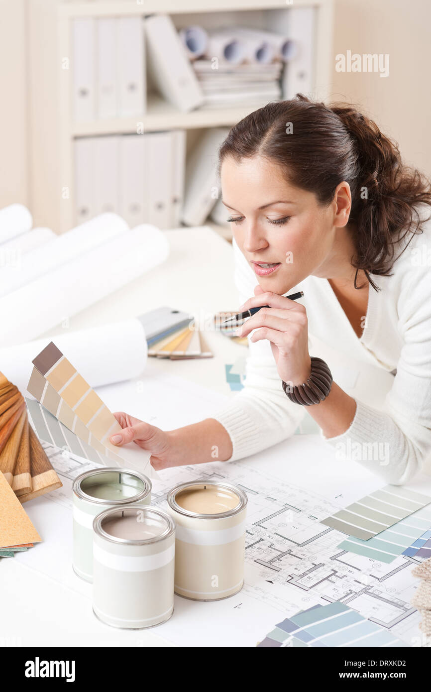 Young female interior designer at office Stock Photo - Alamy