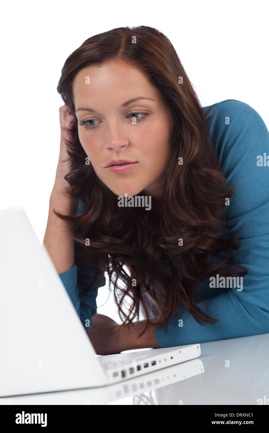 Happy woman with laptop watching screen Stock Photo - Alamy