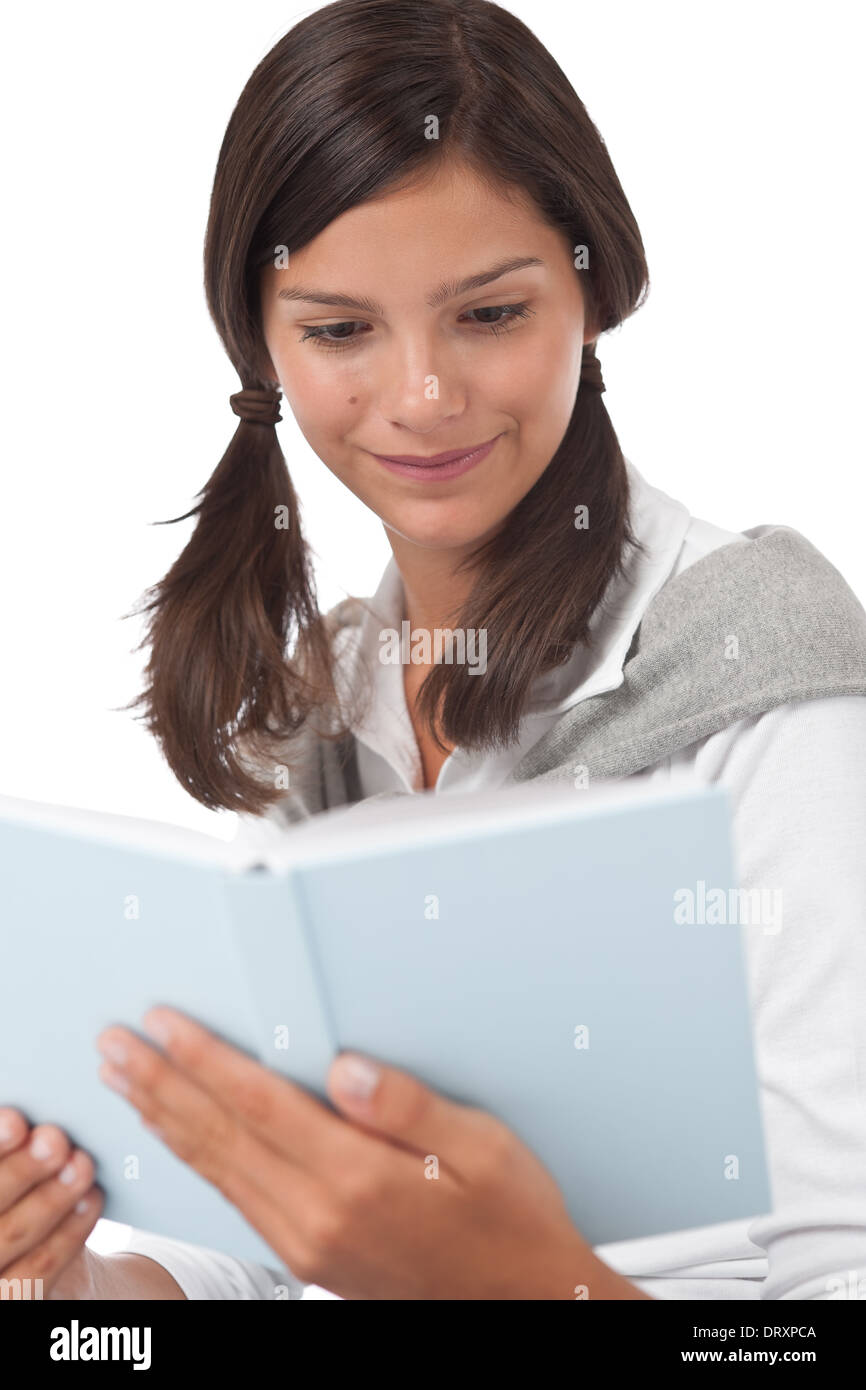 Portrait of teenager reading book Stock Photo - Alamy