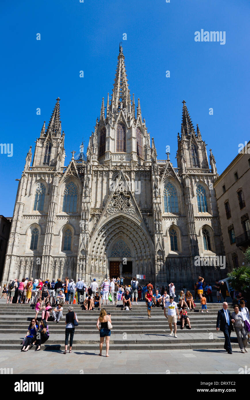 Spain, Catalonia, Barcelona, People on the steps below the main facade ...
