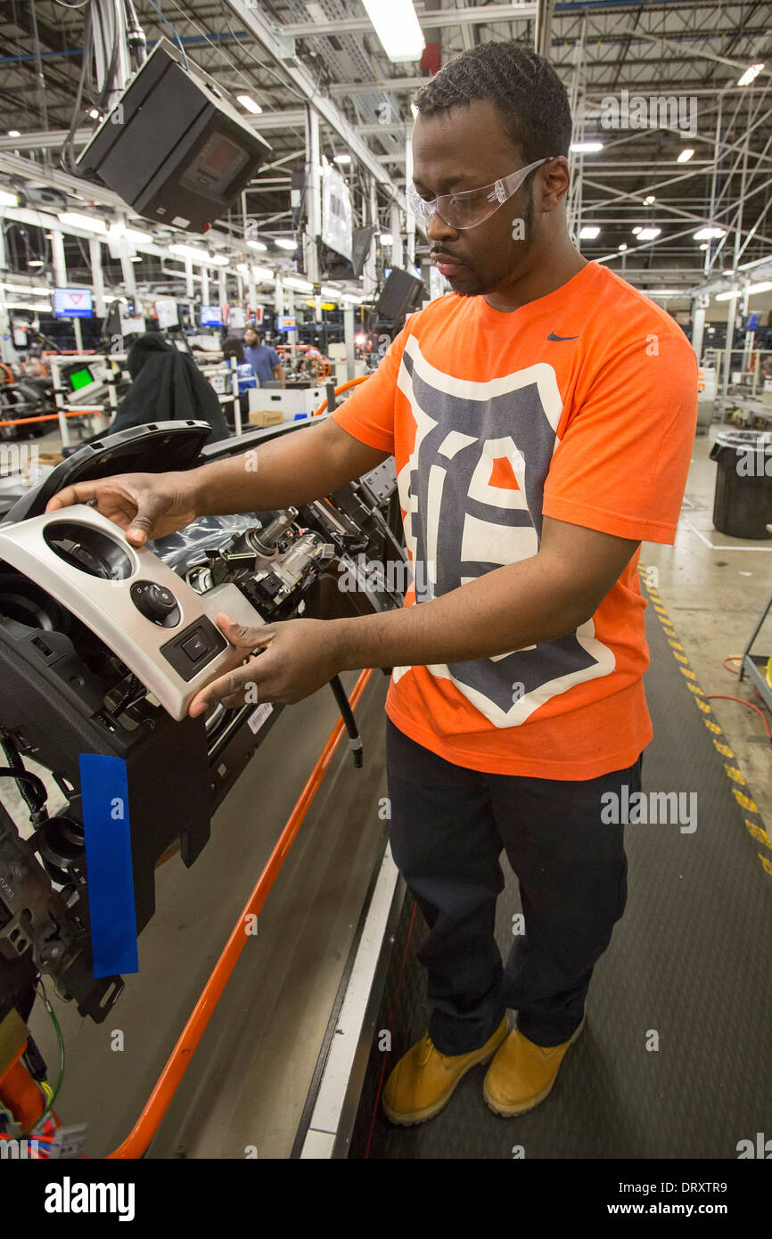 Workers make dashboards for Ford at Detroit Manufacturing Systems Stock ...