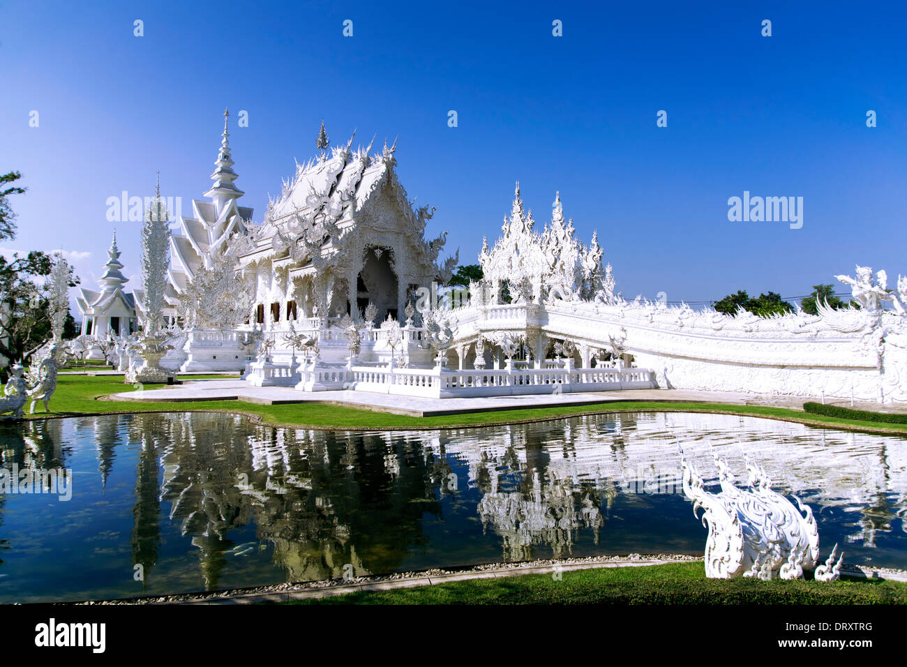 Wat Rong Khun (White Temple) is a contemporary unconventional Buddhist ...