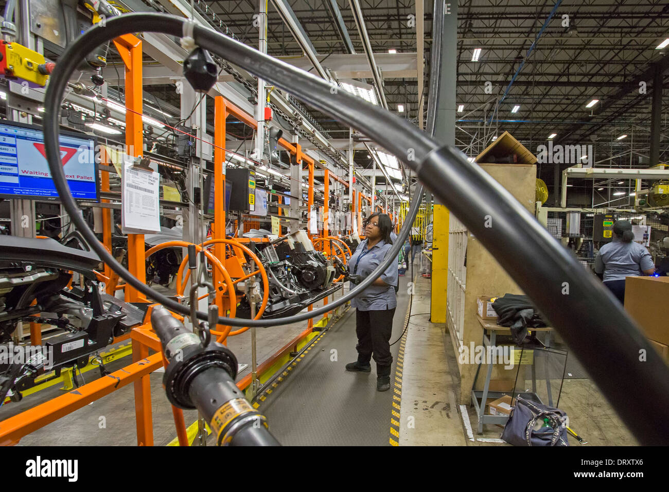 Workers make dashboards for Ford at Detroit Manufacturing Systems Stock ...