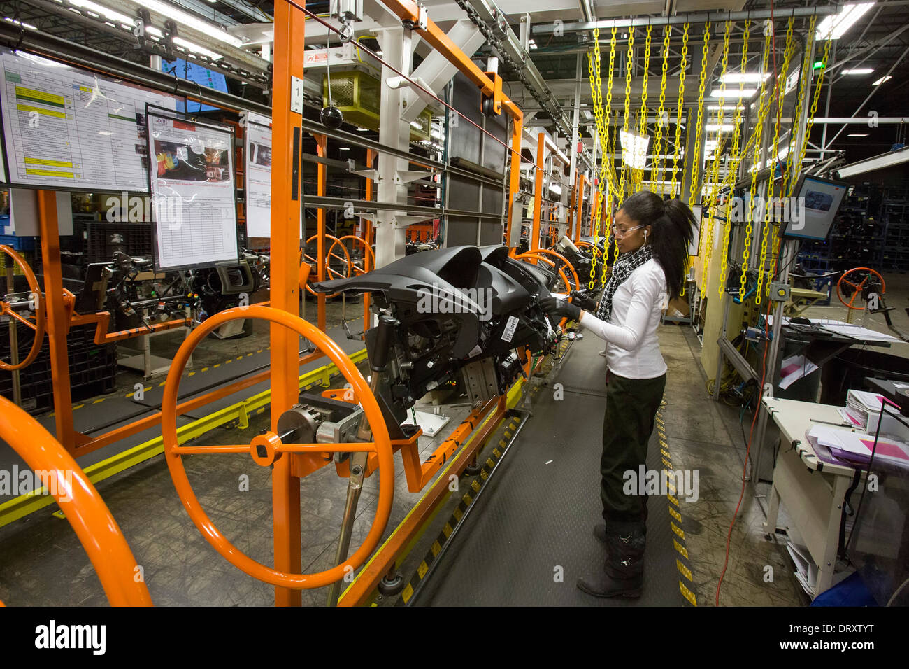 Workers make dashboards for Ford at Detroit Manufacturing Systems Stock ...