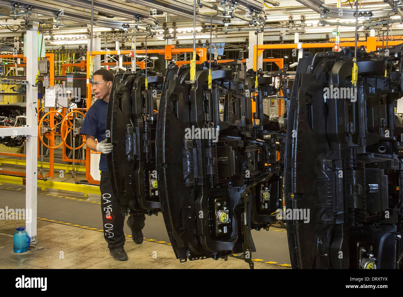 Workers make dashboards for Ford at Detroit Manufacturing Systems Stock ...