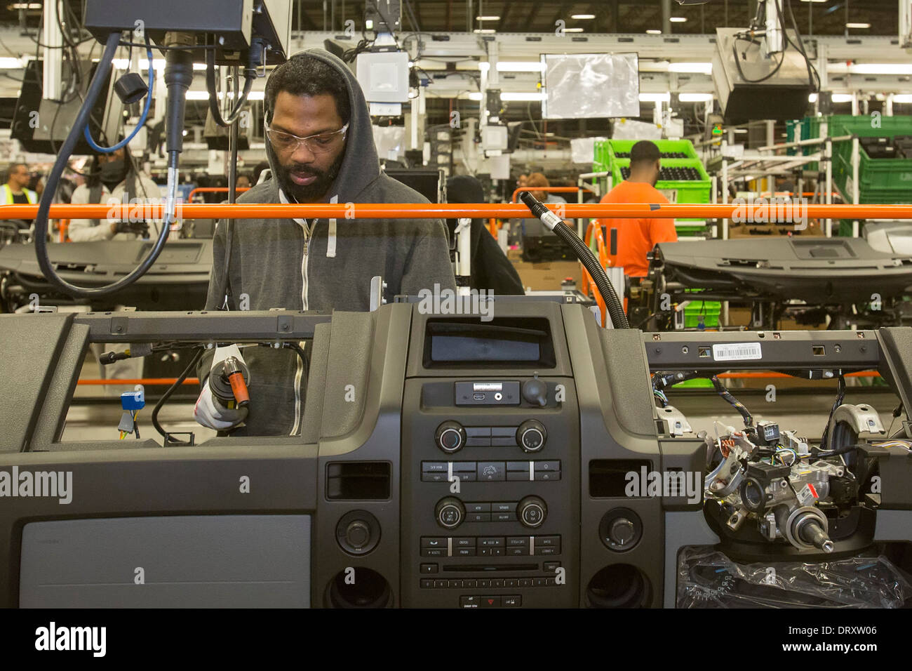 Workers make dashboards for Ford at Detroit Manufacturing Systems Stock ...