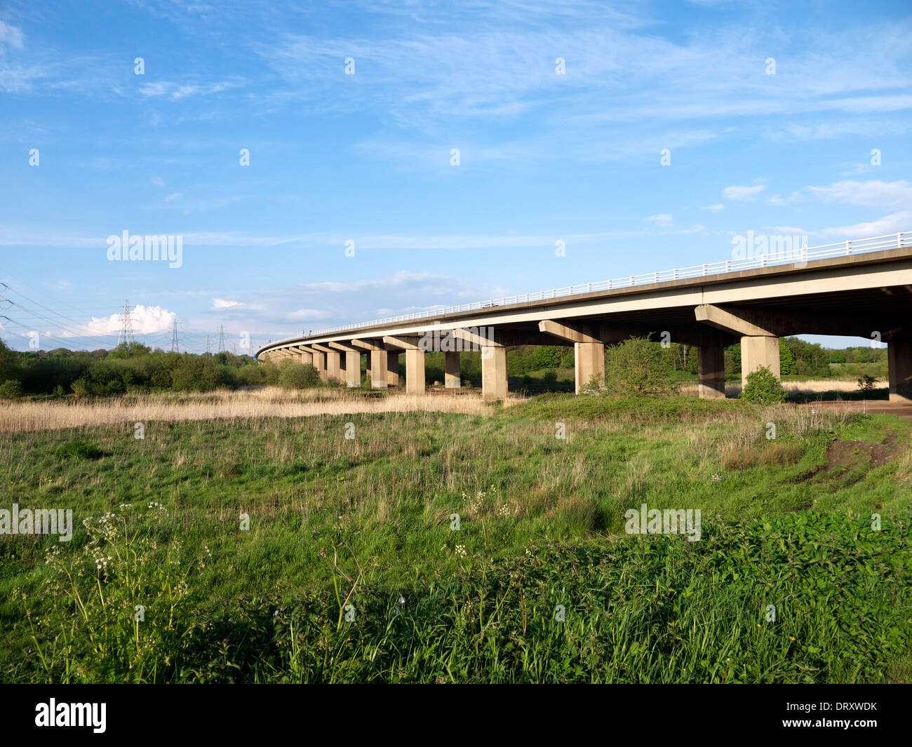 View of a motorway bridge from a field underneath it Stock Photo - Alamy