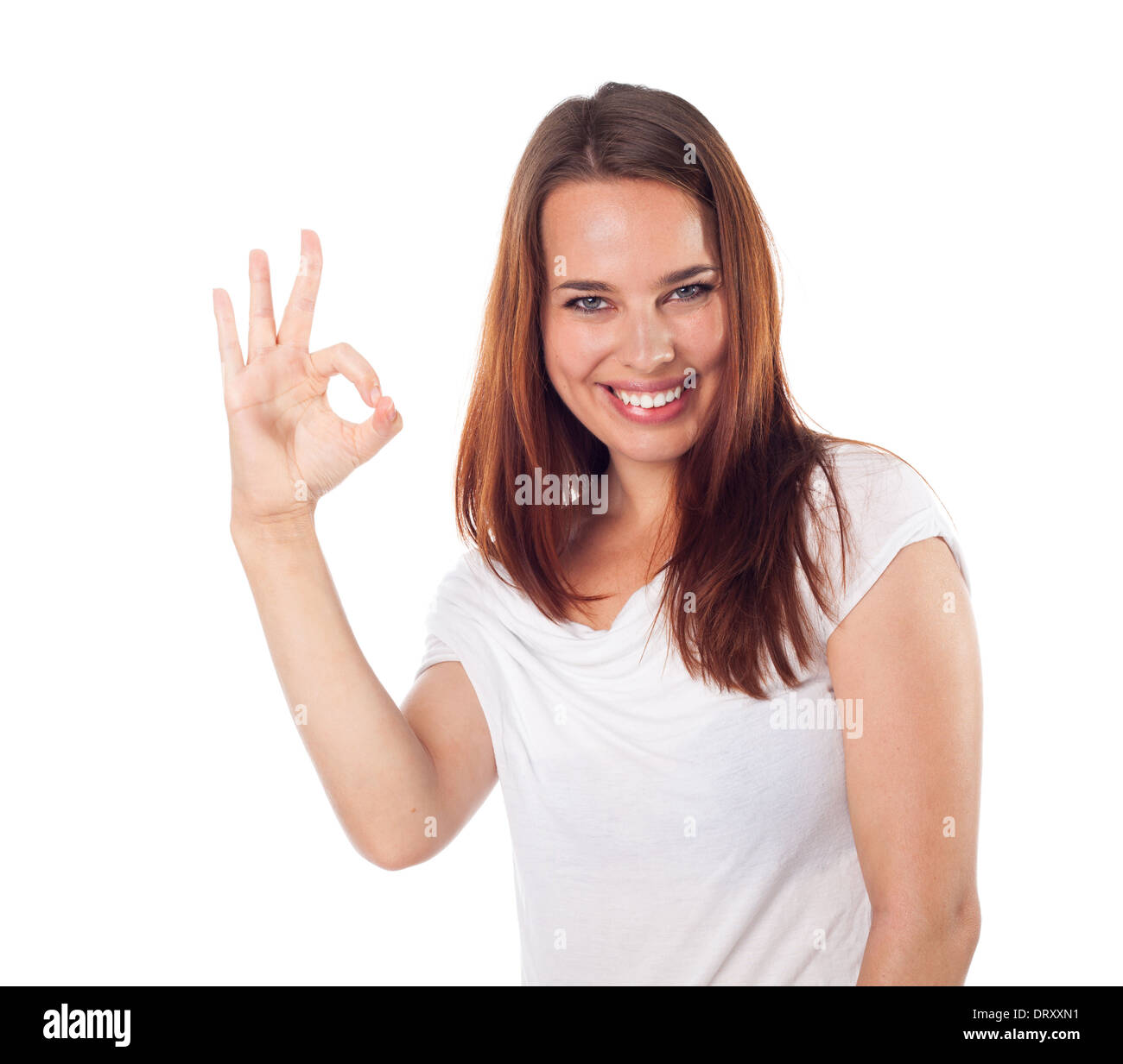 Young cheerful woman showing ok sign, isolated on white Stock Photo - Alamy