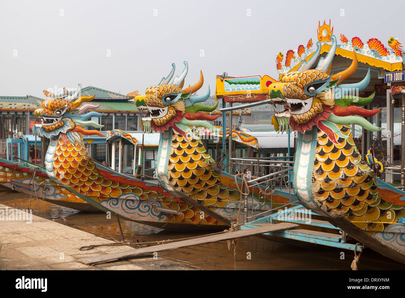 Dragon Tour Boats on the Riverside Hue Vietnam Stock Photo - Alamy
