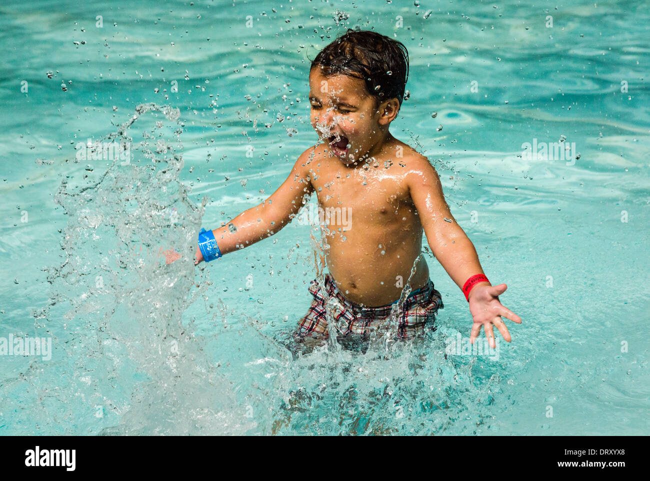 Boy and splash hi-res stock photography and images - Alamy