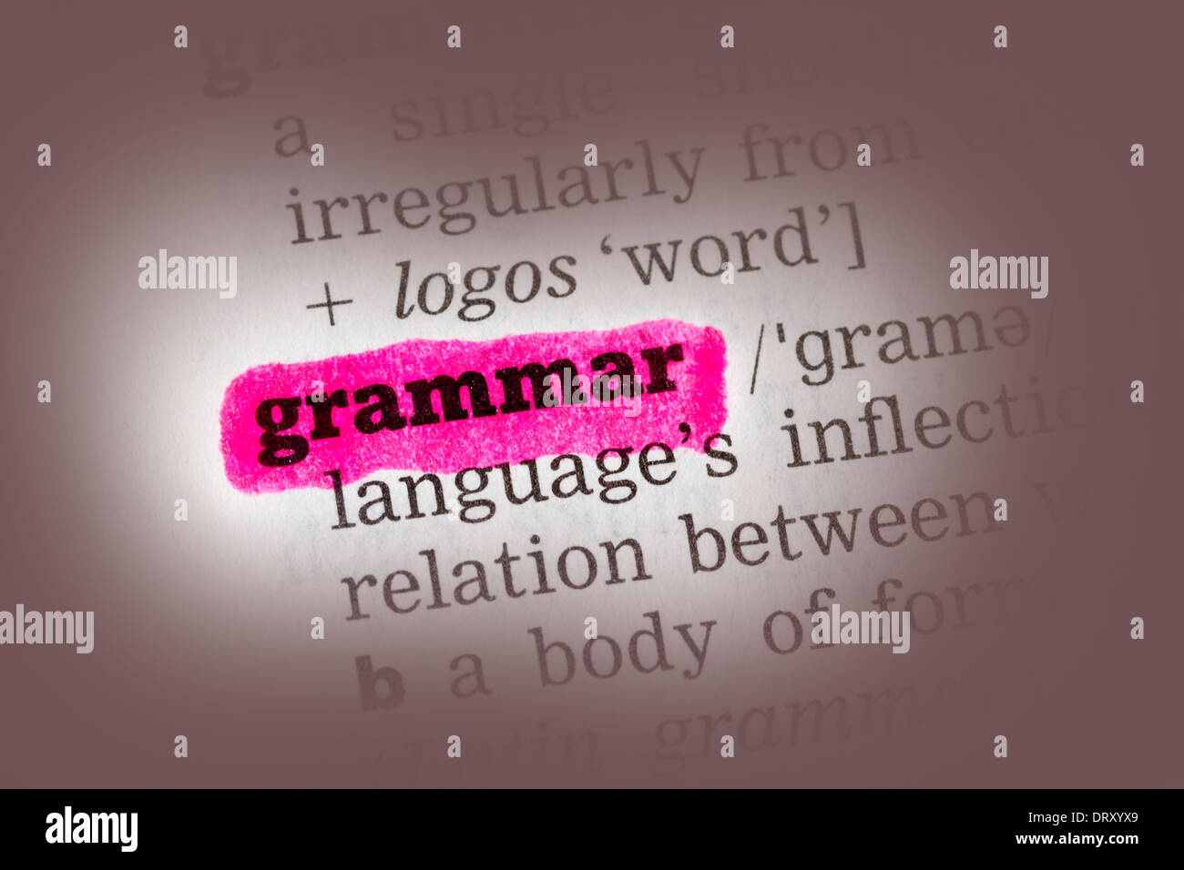 Grammar Dictionary Definition closeup highlighted in pink Stock Photo ...