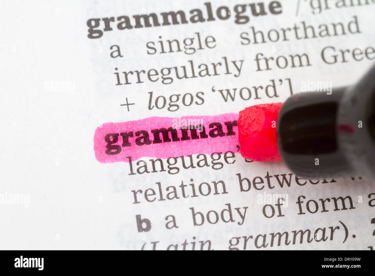 Grammar Dictionary Definition closeup highlighted in pink Stock Photo ...