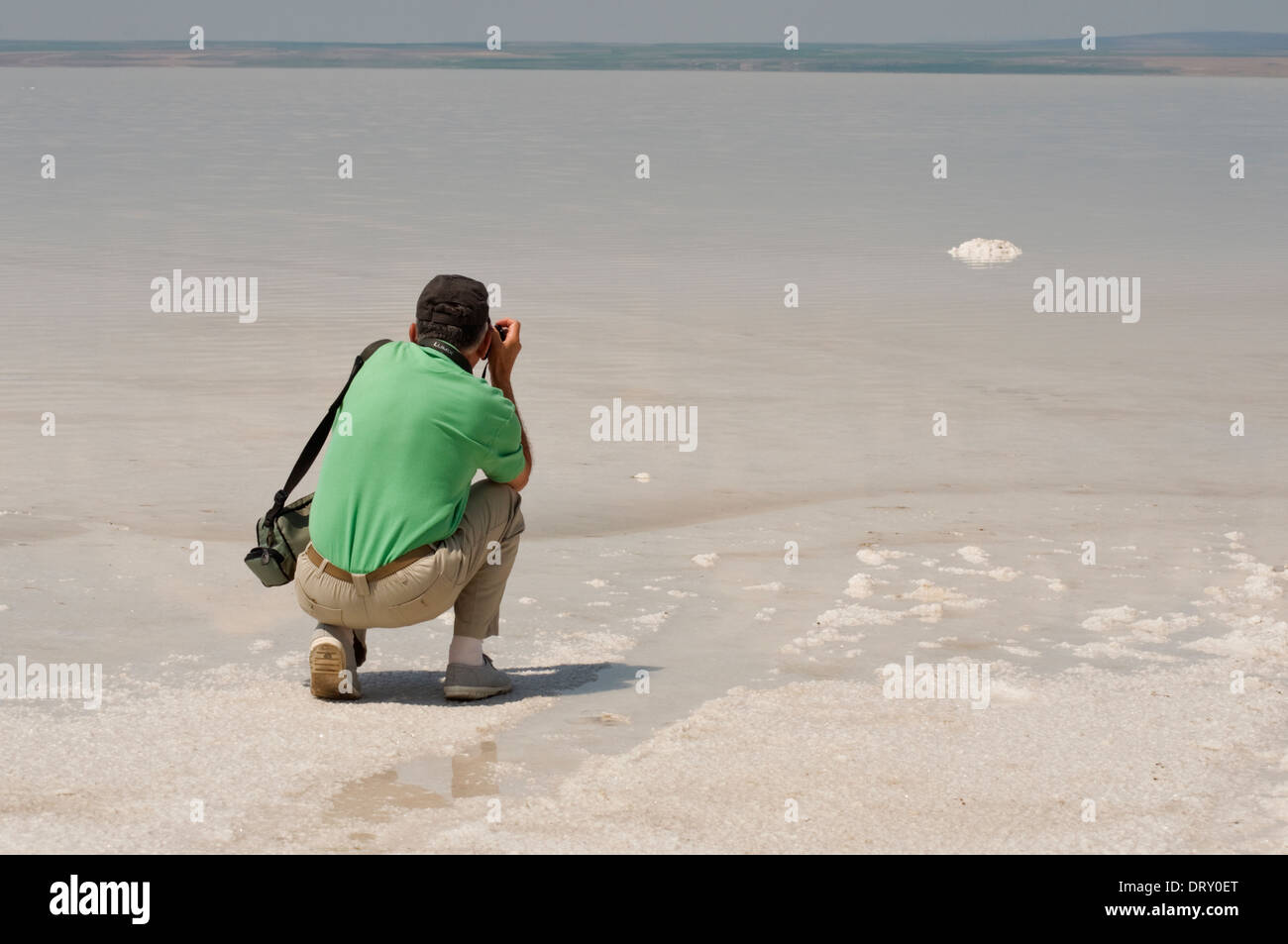 ASIA, Turkey, Middle Anatolia, Salt Lake (Tuz Gölű), man photographing ...